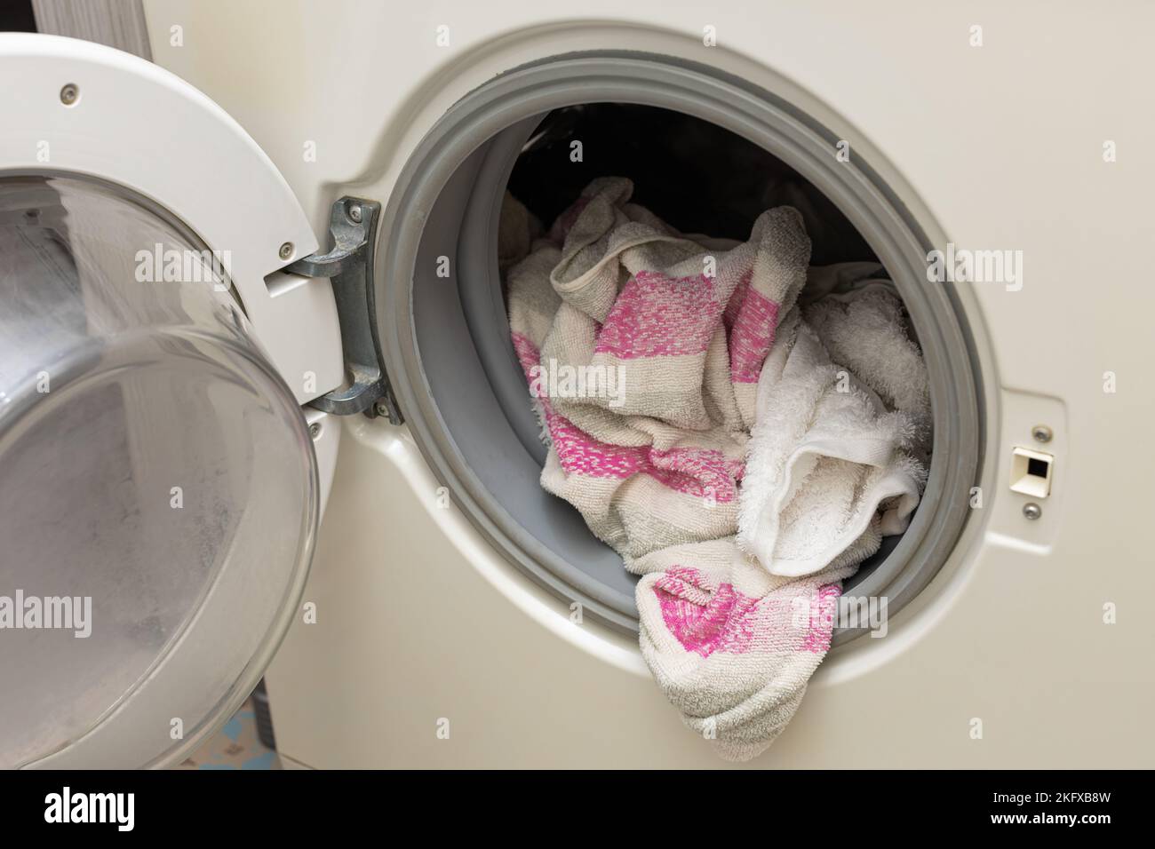 Washing machine clothes hi-res stock photography and images - Alamy