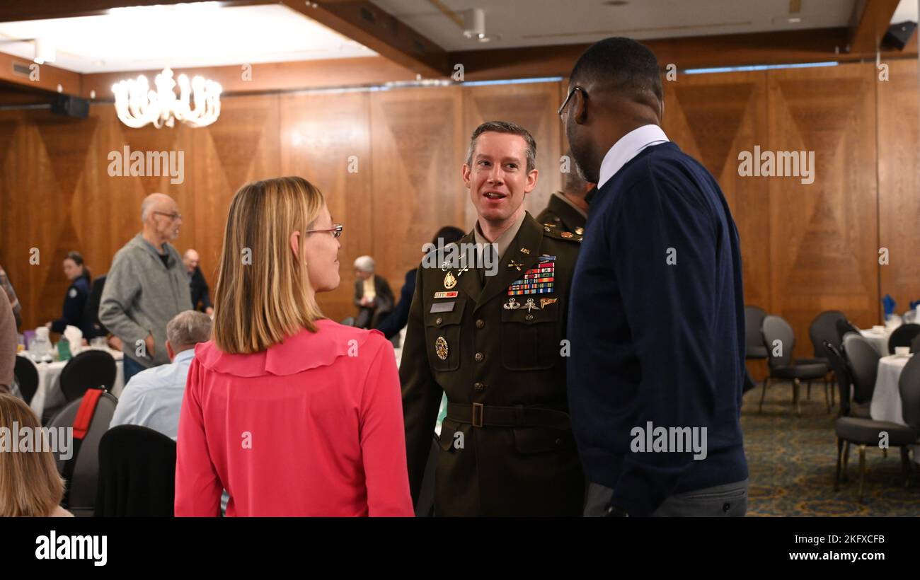 Garrison Commander Col. Reid E. Furman meets with retirees after the ...