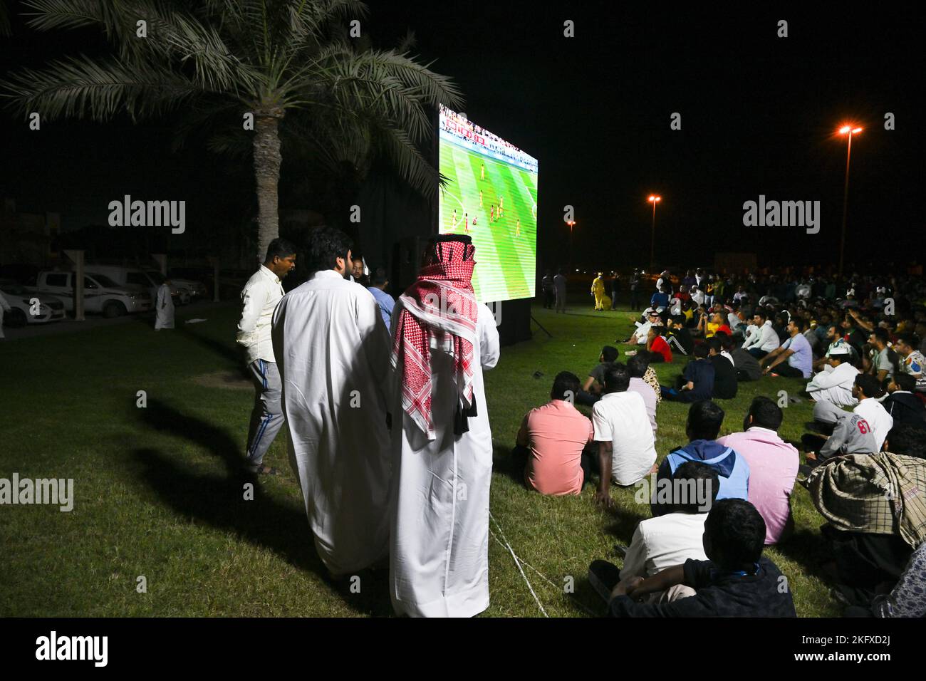 Al Ruwais, Qatar. 20th Nov, 2022. Residents of Al-Ruwais watch the ...