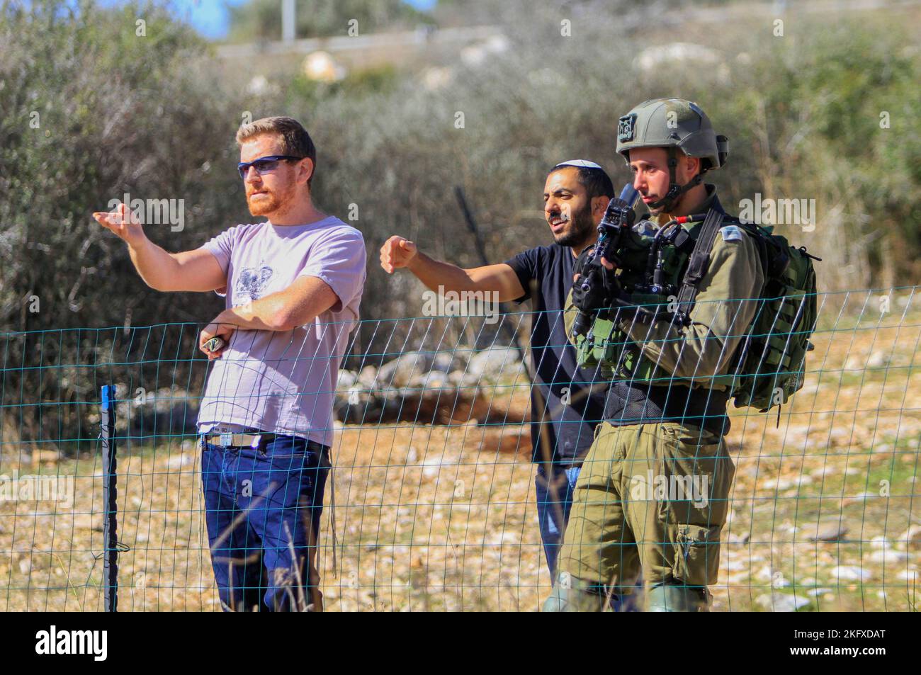 Salfit, Palestine. 20th Nov, 2022. Israeli soldiers guard Jewish ...