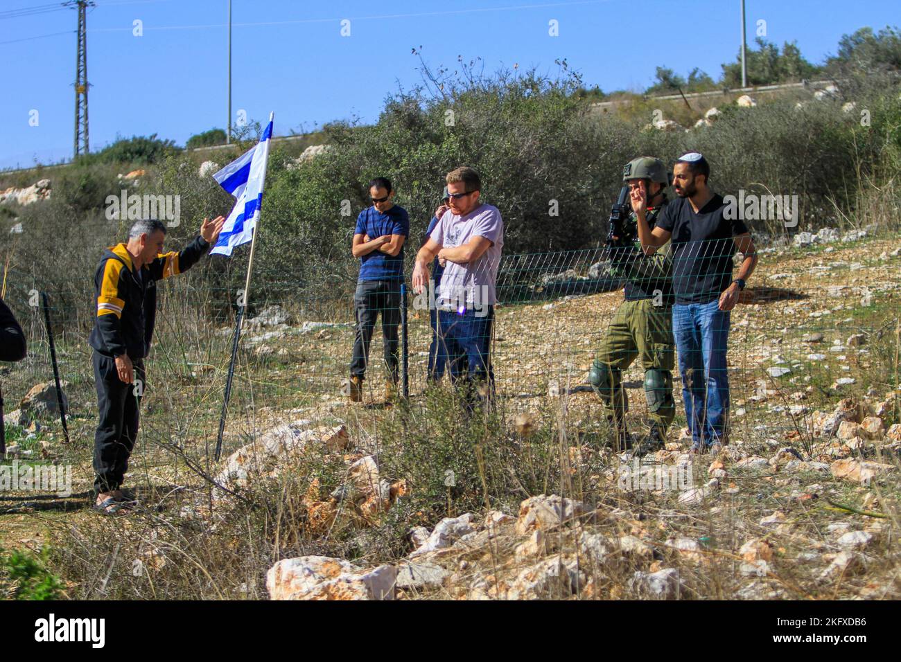 Salfit, Palestine. 20th Nov, 2022. Israeli soldiers guard Jewish ...