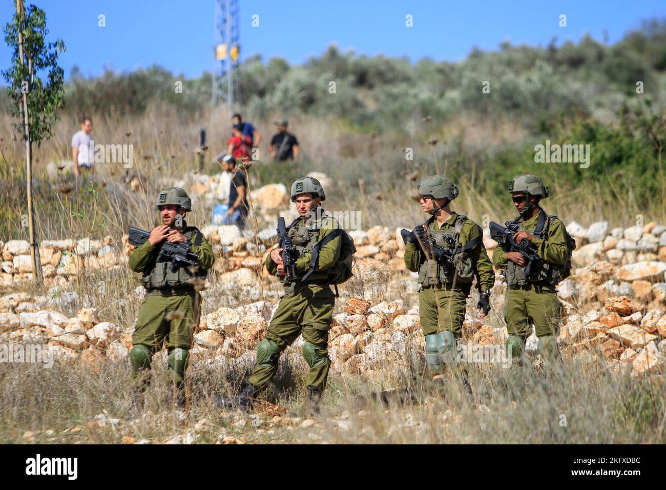 Salfit, Palestine. 20th Nov, 2022. Israeli soldiers guard Jewish ...