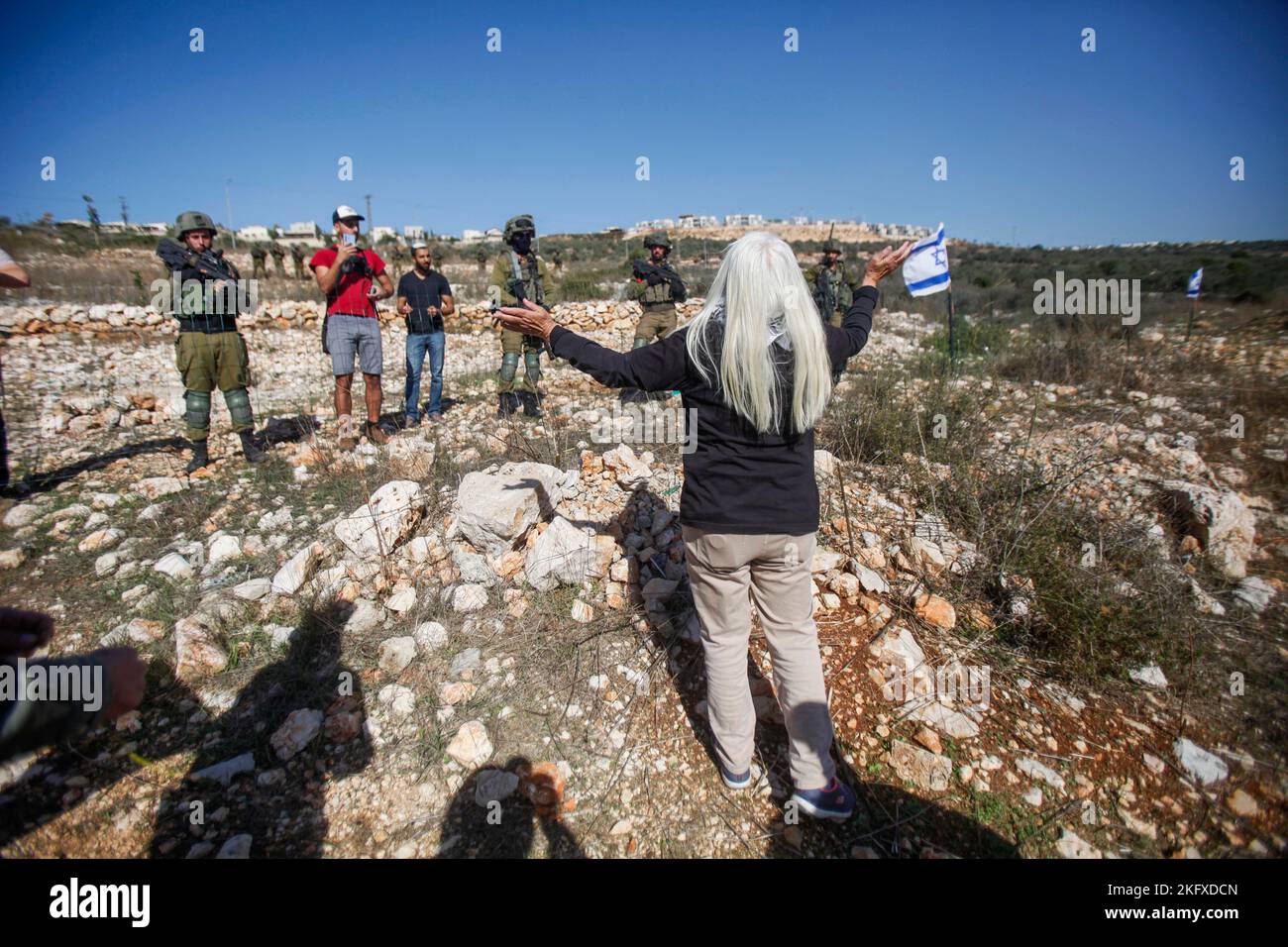 Salfit, Palestine. 20th Nov, 2022. A Palestinian protester demonstrates ...