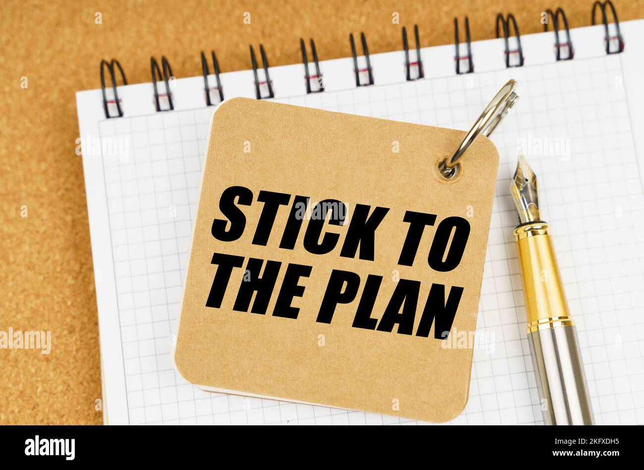 Business and economy concept. There are two notebooks and a pen on the ...