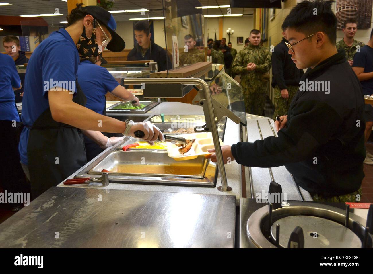 GREAT LAKES (Oct. 13, 2022) An "A" school student gets steak and ...