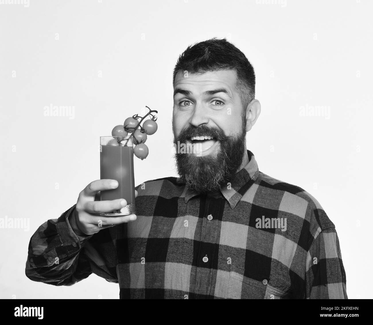 Man holds glass red Black and White Stock Photos & Images - Alamy