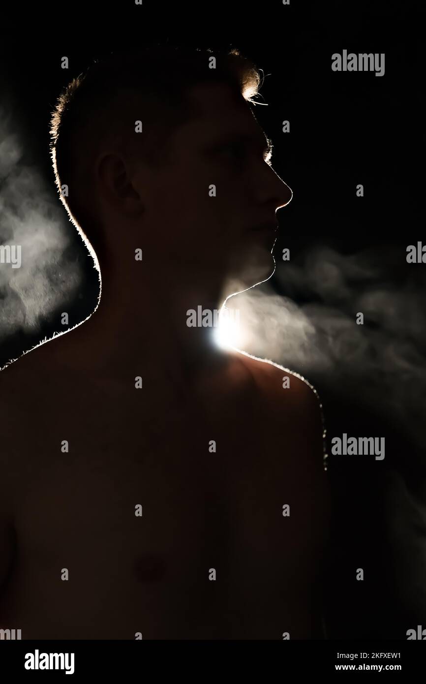 silhouette of a guy. men in the dark. smoke . steam . man in a dark ...