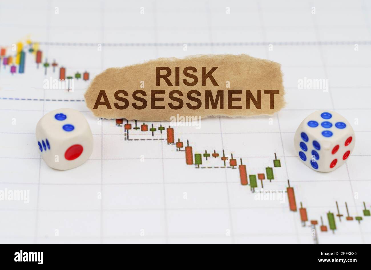 Business and finance concept. On the trading charts, there are dice and ...