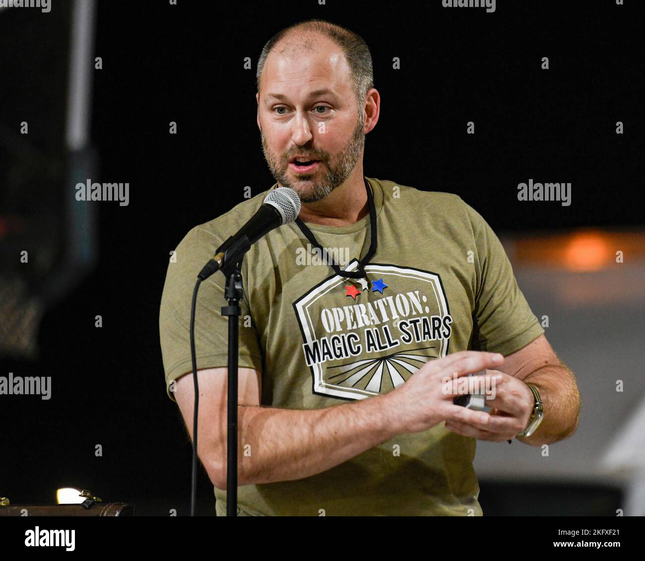 Jason Michaels, a magician with Operation Magic All Stars, performs a ...