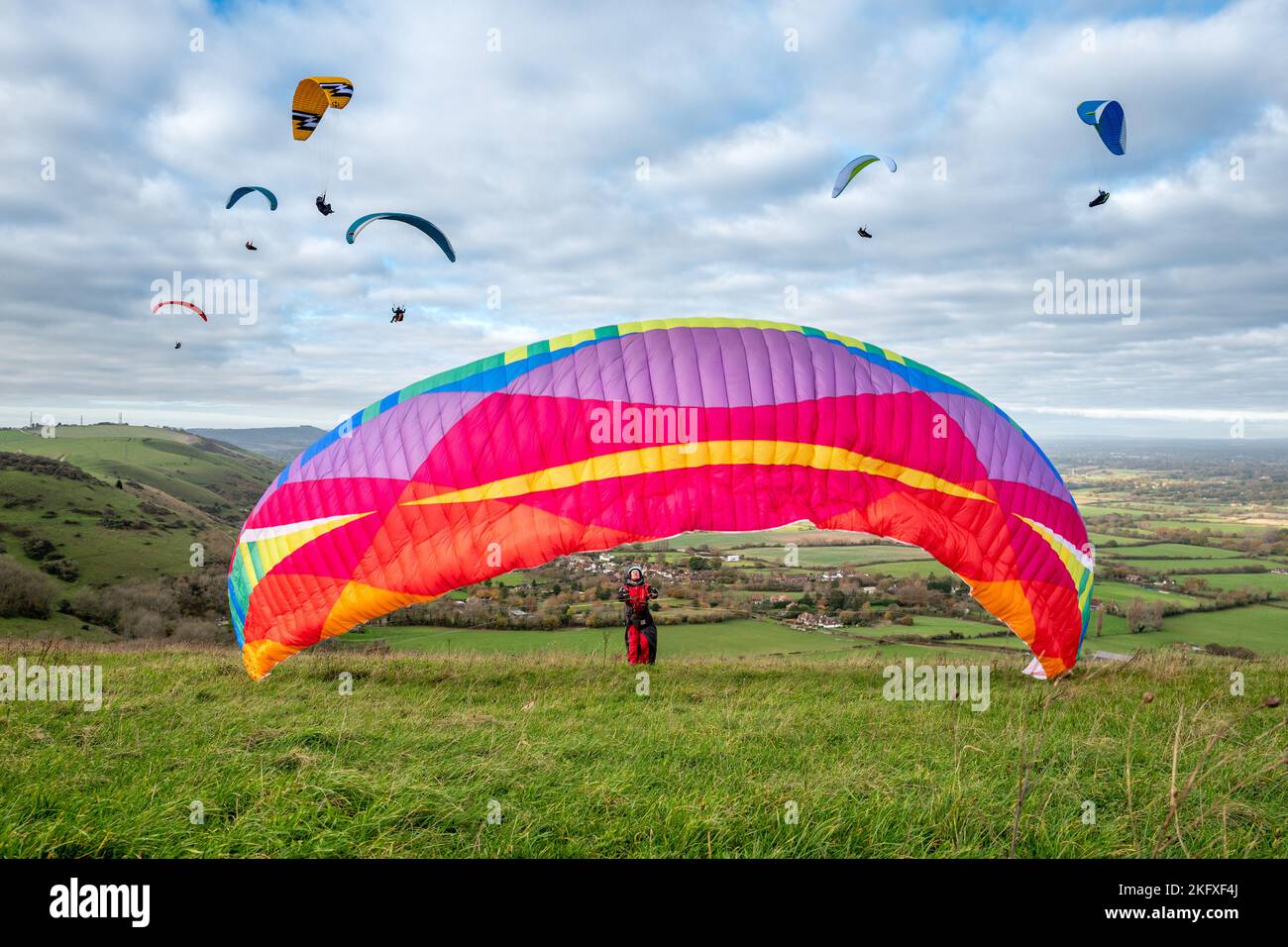 Brighton, November 19th 2022: A paraglider inflates his wing prior to ...
