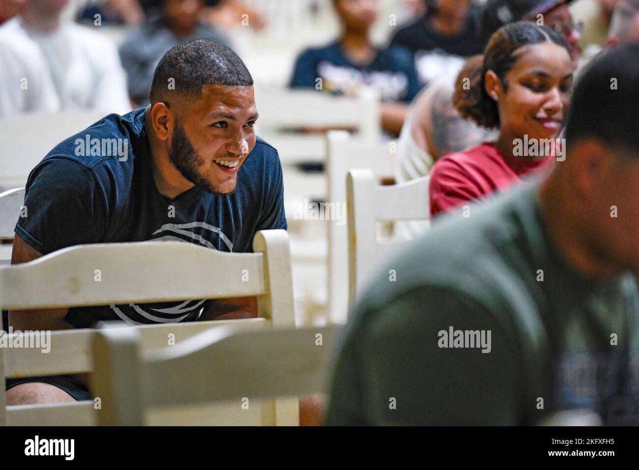 A U.S. service member, deployed to Prince Sultan Air Base, smiles after ...