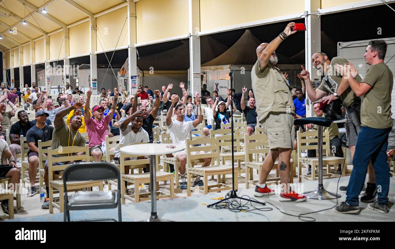 U.S. service members, deployed to Prince Sultan Air Base, cheer for the ...