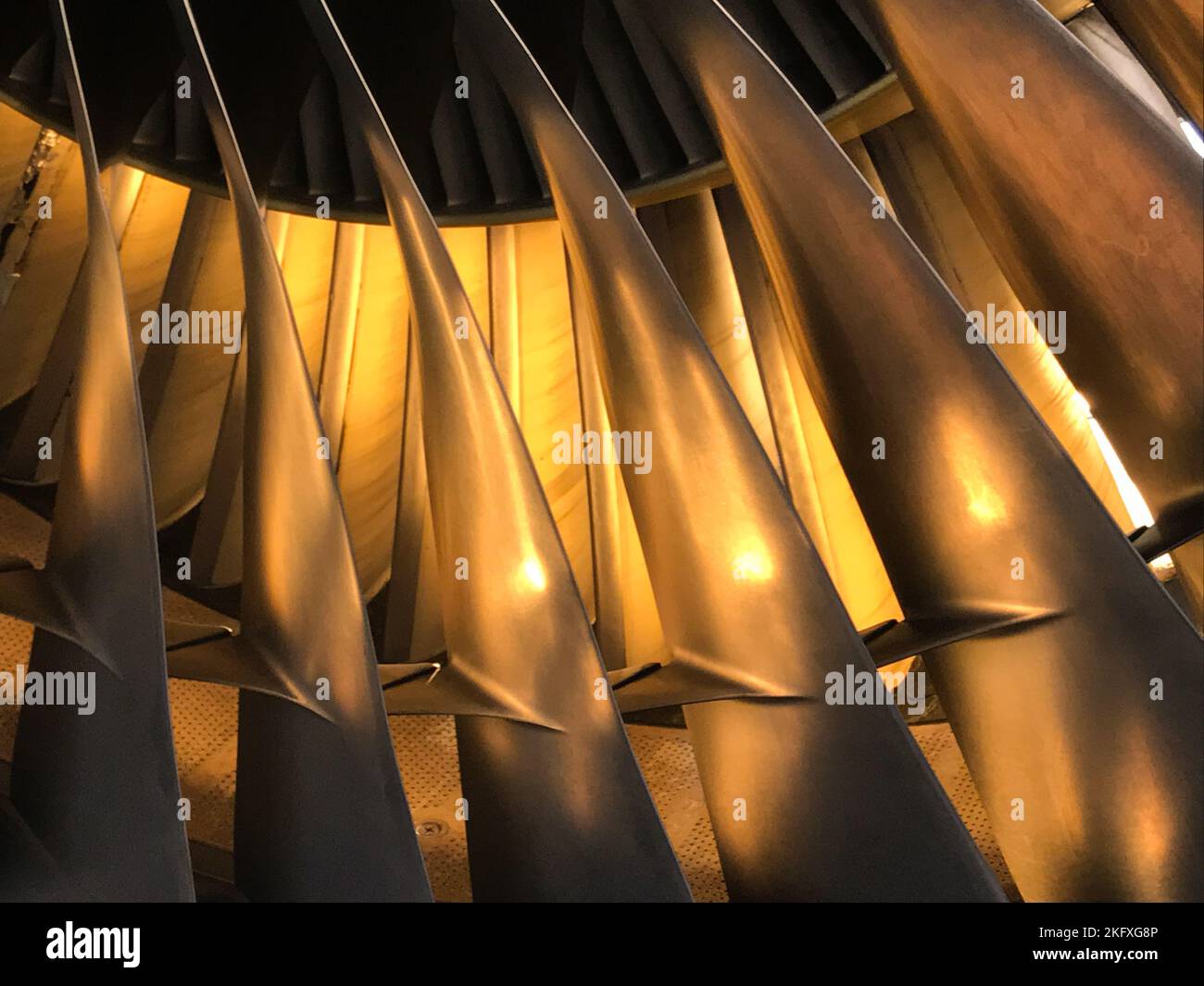 An illuminated jet engine in golden colors Stock Photo - Alamy