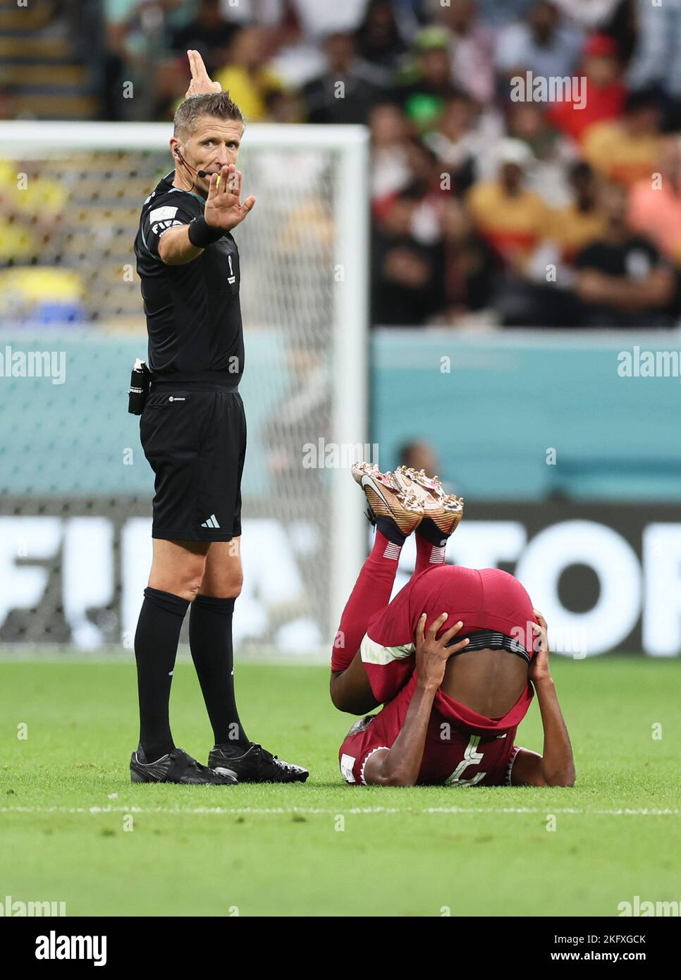 Al Khor, Qatar. 20th Nov, 2022. Referee Daniele Orsato (L) gestures ...