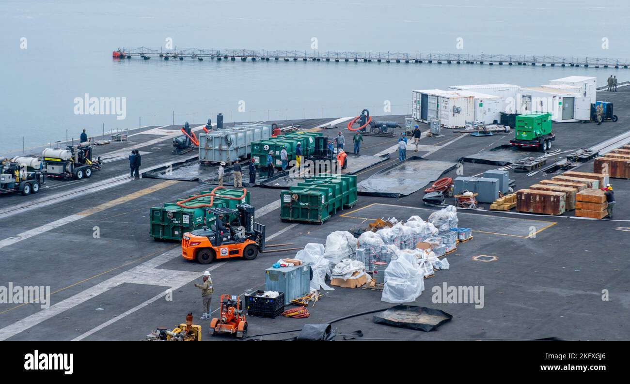221013-N-CY569-1011 NORFOLK, Va. (Oct. 13, 2022) Contractors remove a ...