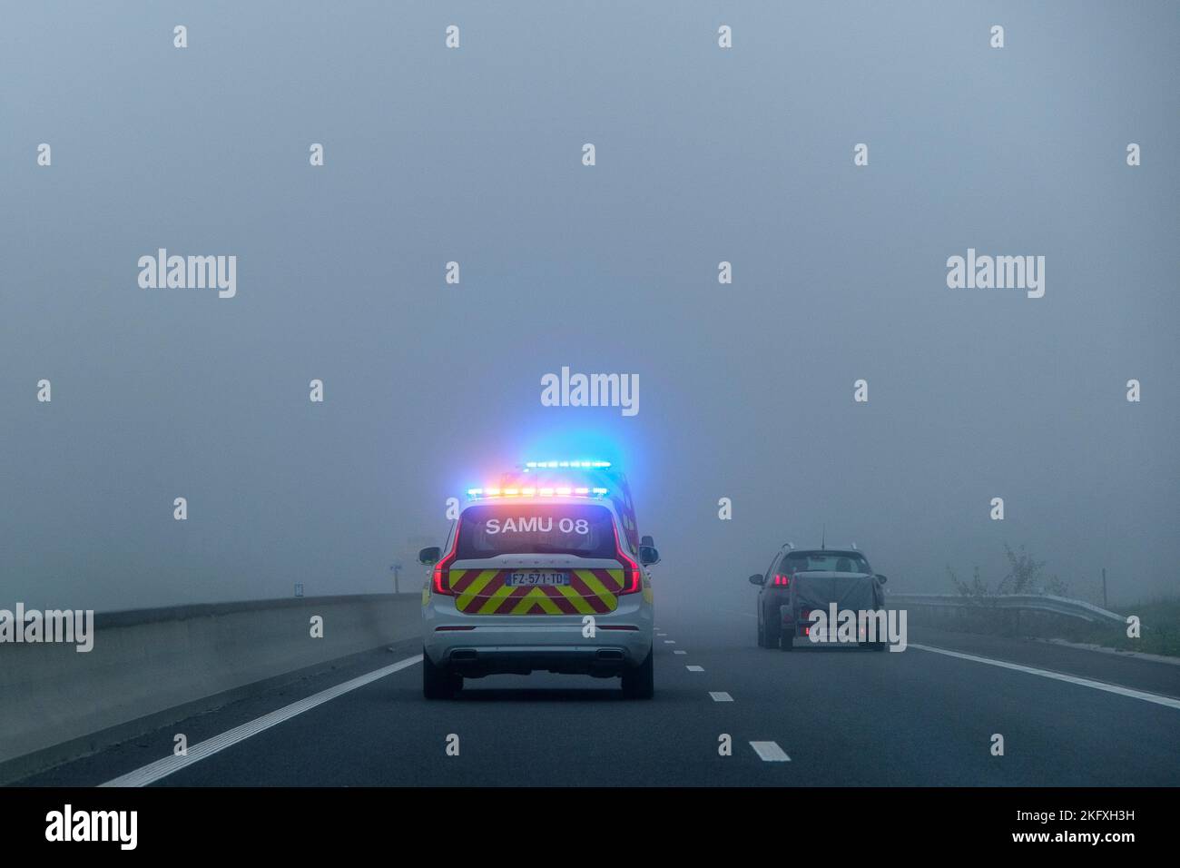 SAMU 08 car and emergency help ambulance on their way on an highway in the mist | Voiture du ...