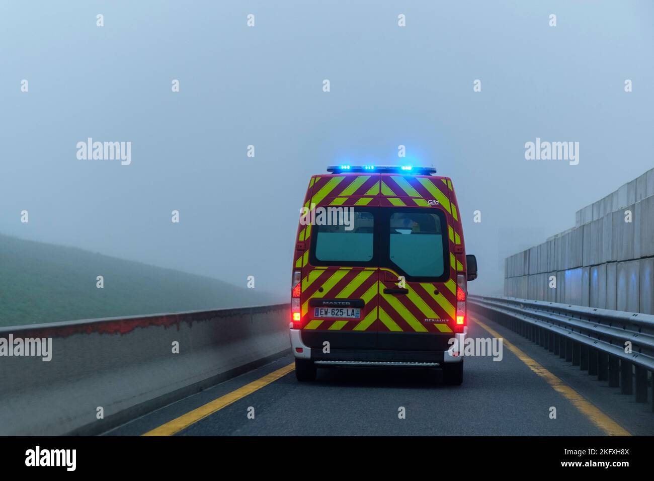 SAMU 08 car and emergency help ambulance on their way on an highway in the mist | Voiture du ...
