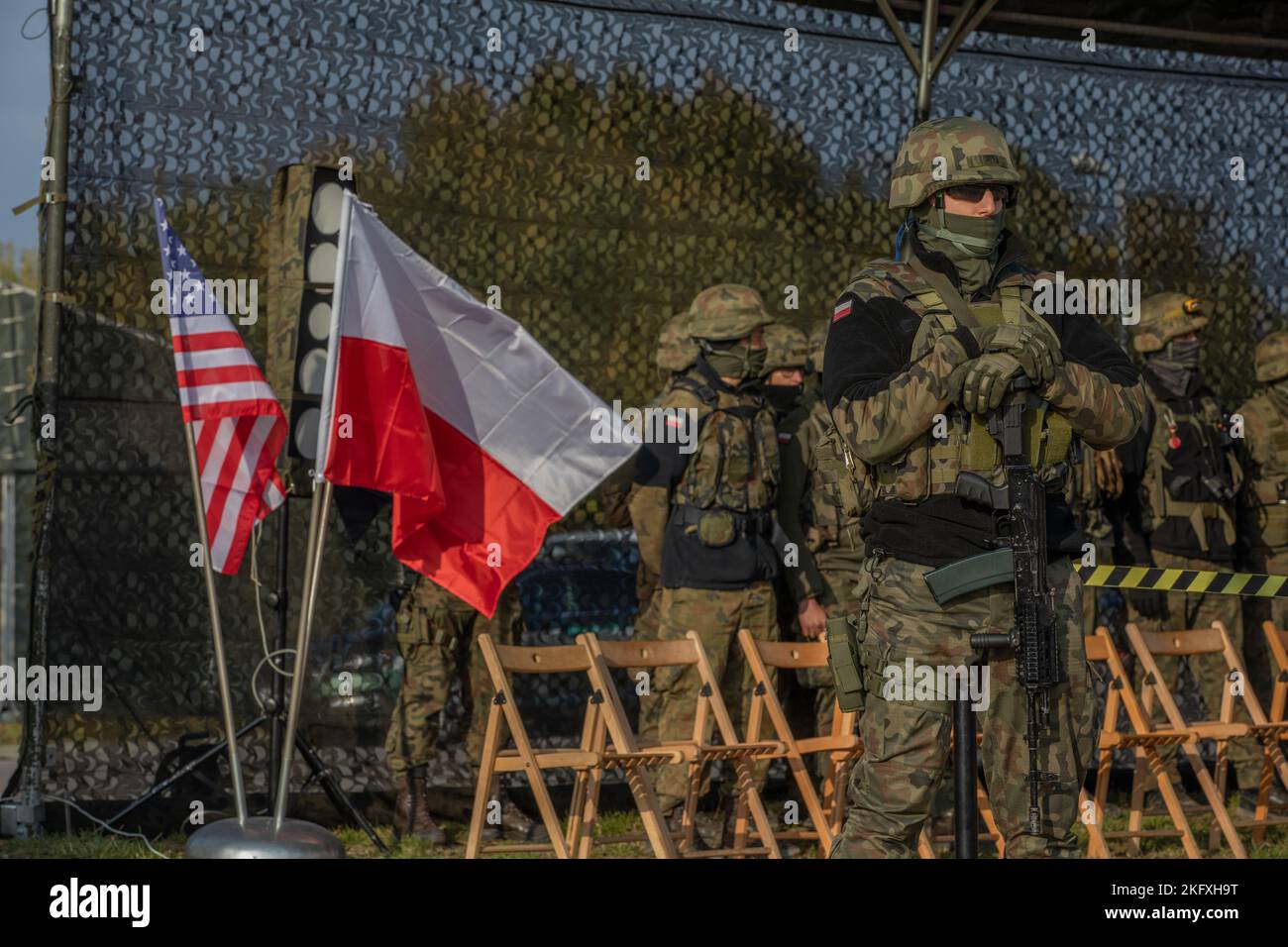 Polish soldiers from the 11th Lubuska Armored Cavalry Division watch ...
