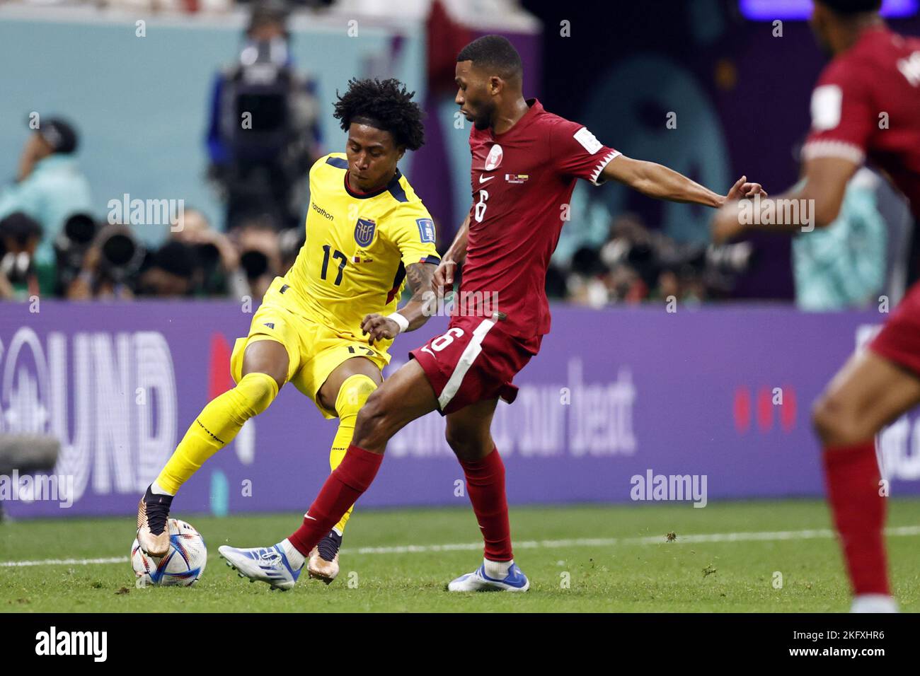 AL KHOR - (l-r) Angelo Preciado of Ecuador, Abdulaziz Hatem of Qatar during the FIFA World Cup ...