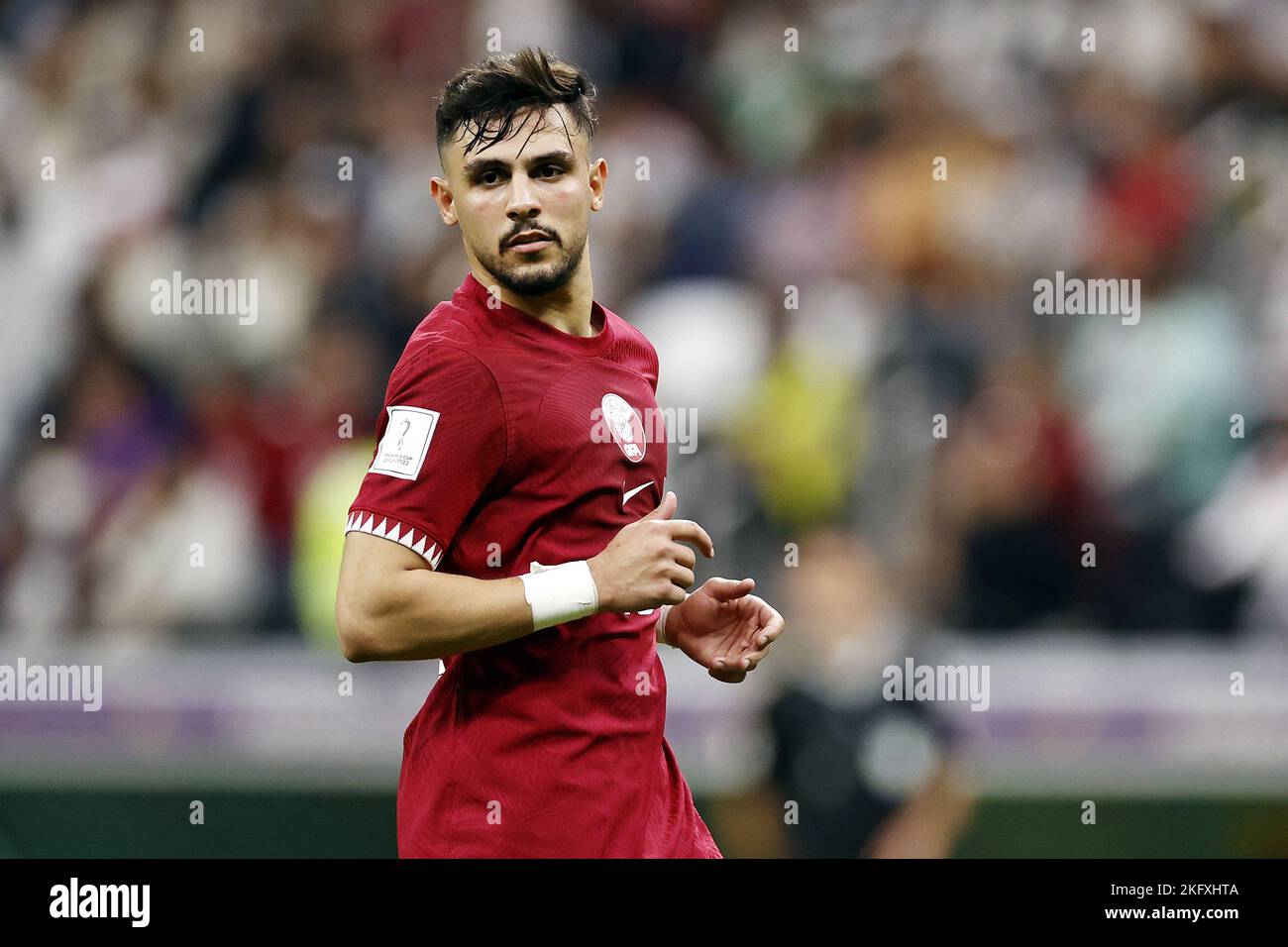 AL KHOR - (l-r) Bassam Al-Rawi of Qatar during the FIFA World Cup Qatar ...