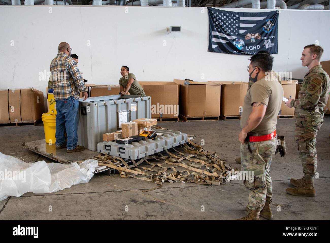Members with the 374th Logistics Readiness Squadron cargo deployment ...