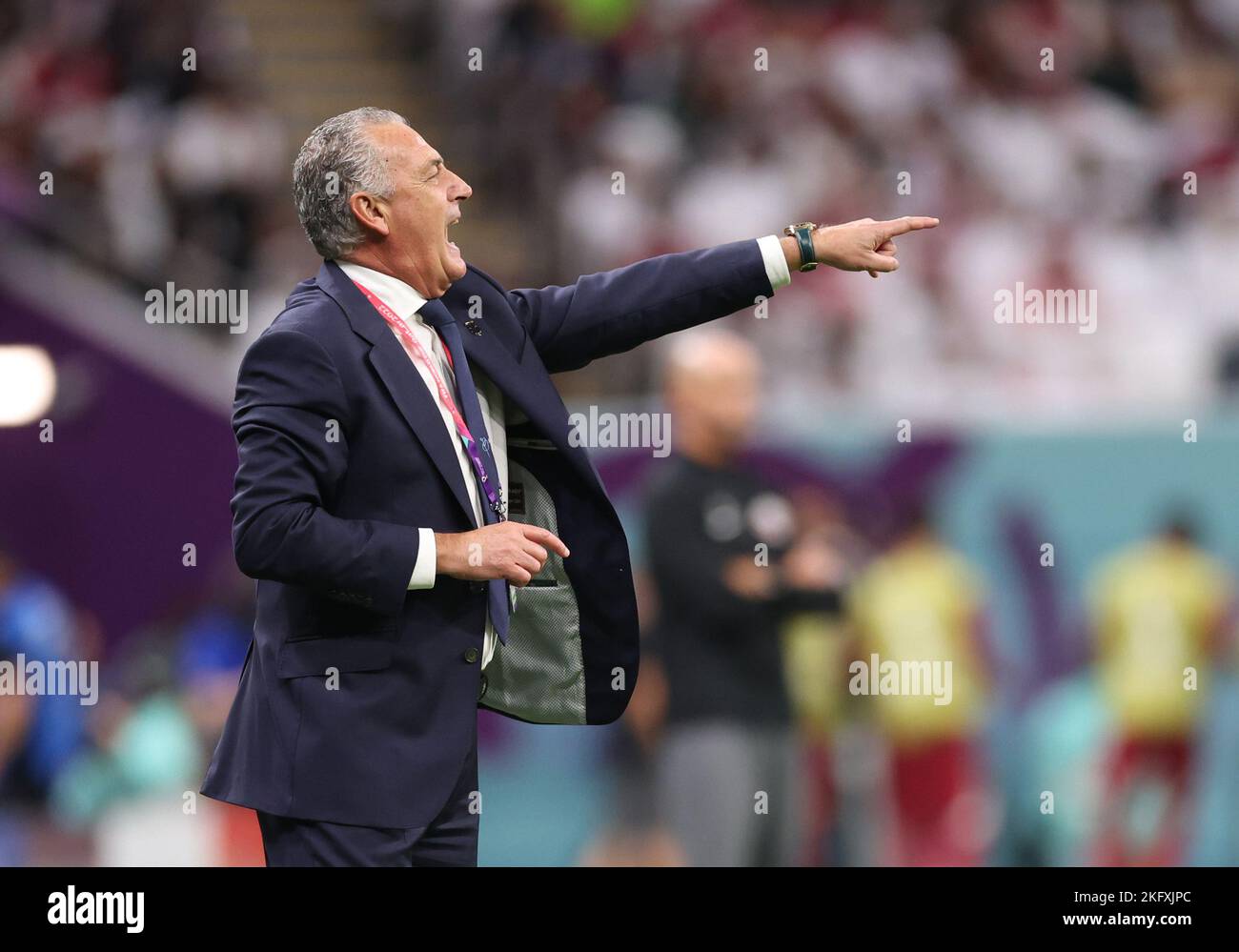 Al Khor, Qatar. 20th Nov, 2022. Gustavo Alfaro (L), head coach of ...