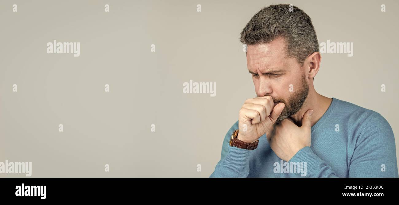 Man face portrait, banner with copy space. sick man has cough on grey ...
