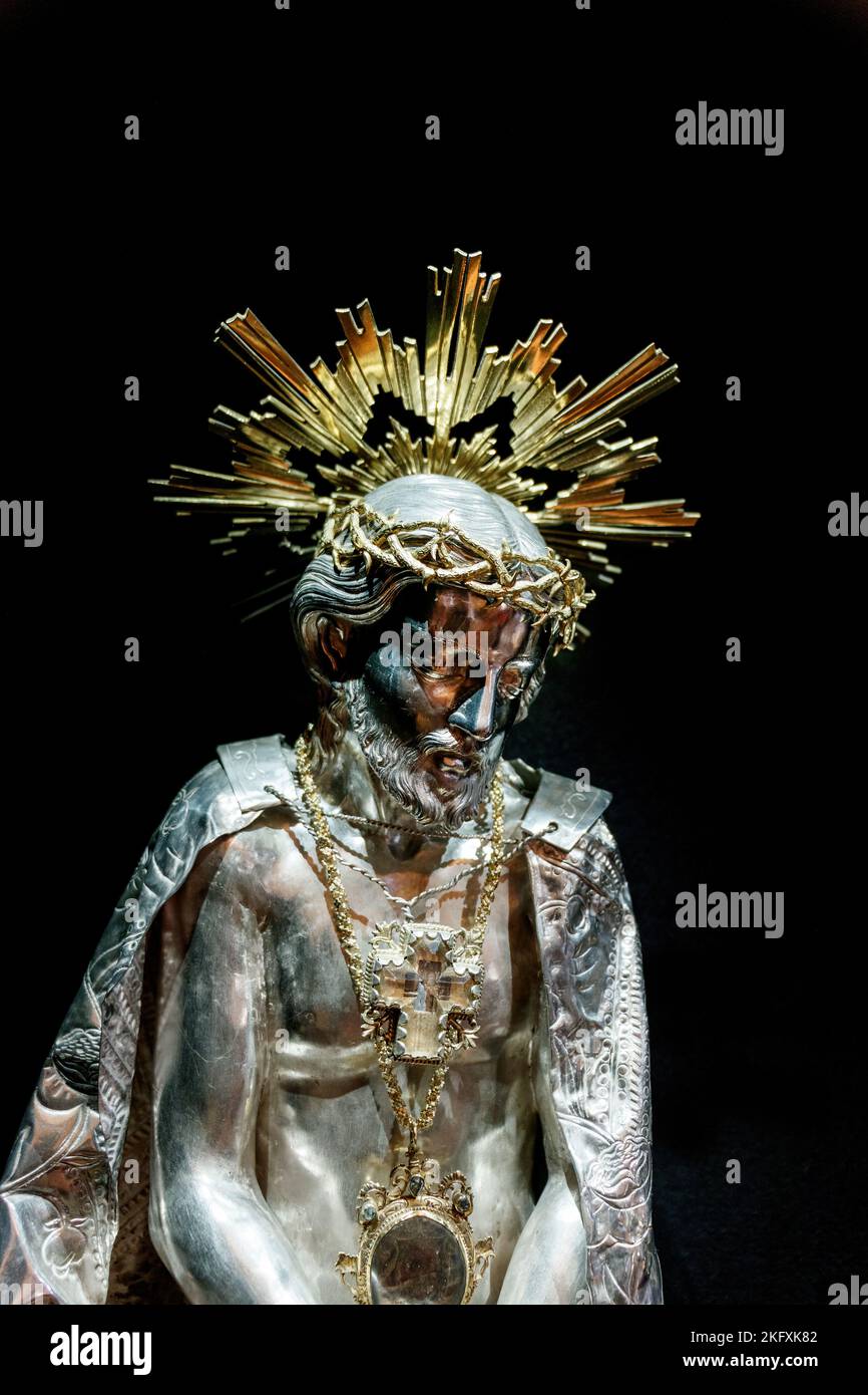 metal sculpture statue of jesus christ isolated on black background in ...