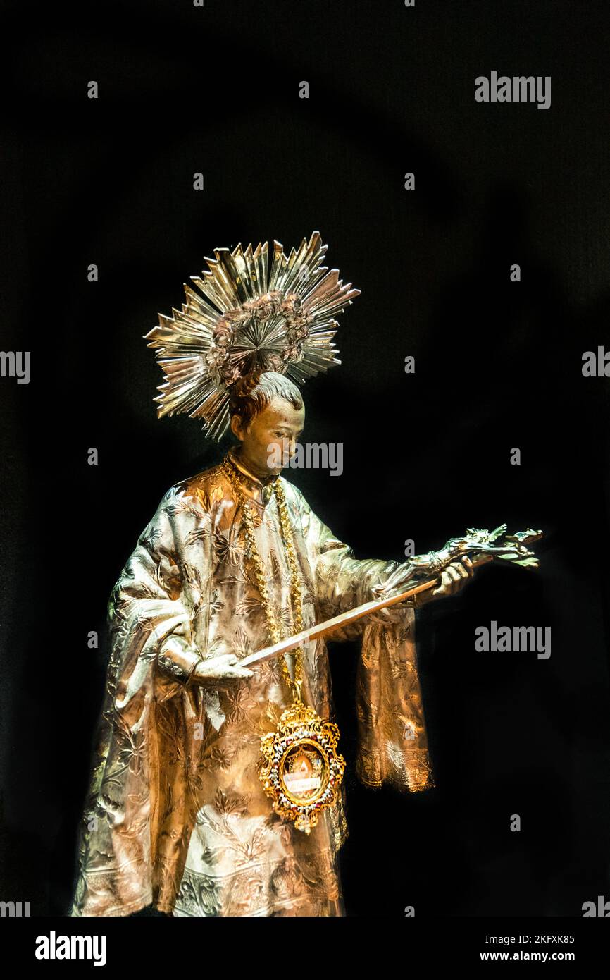 metal sculpture statue of jesus christ isolated on black background in ...
