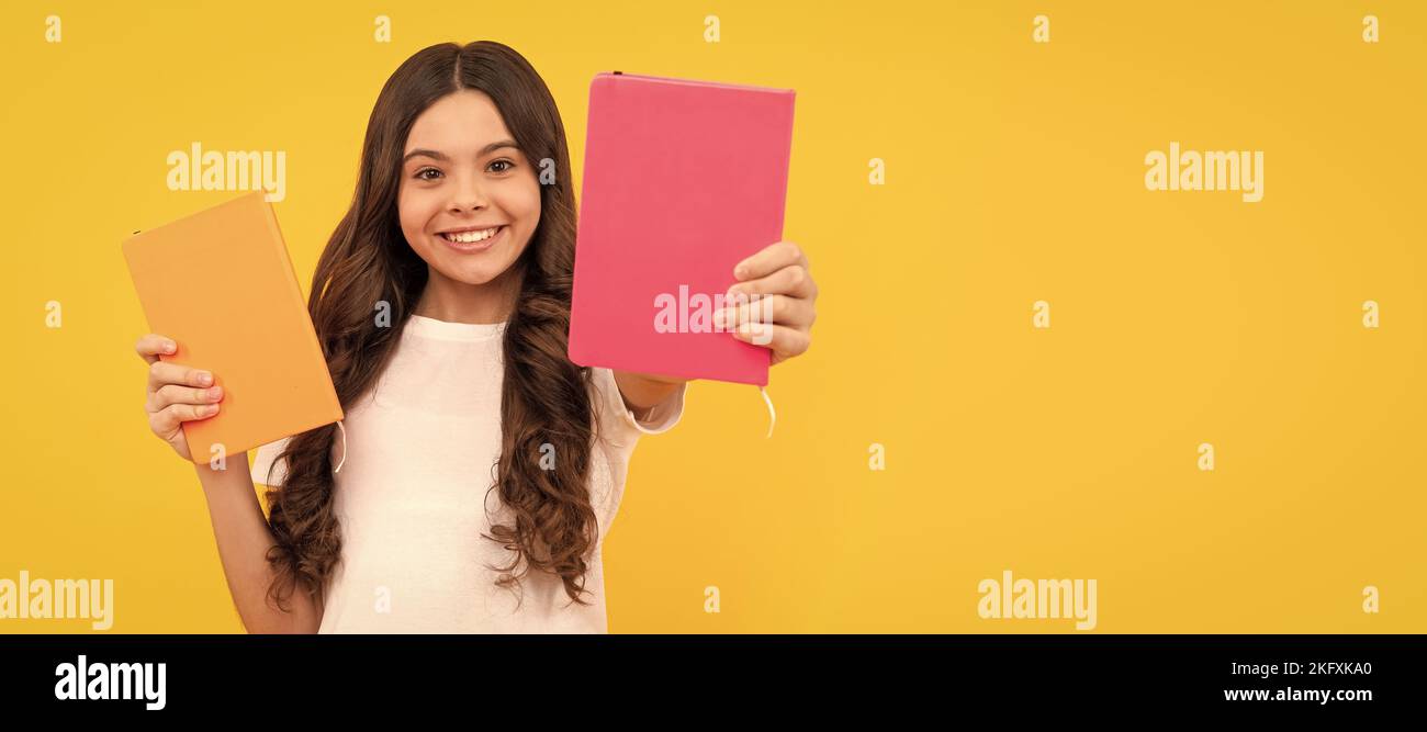 smiling school child ready to study show notepad, school. Horizontal ...