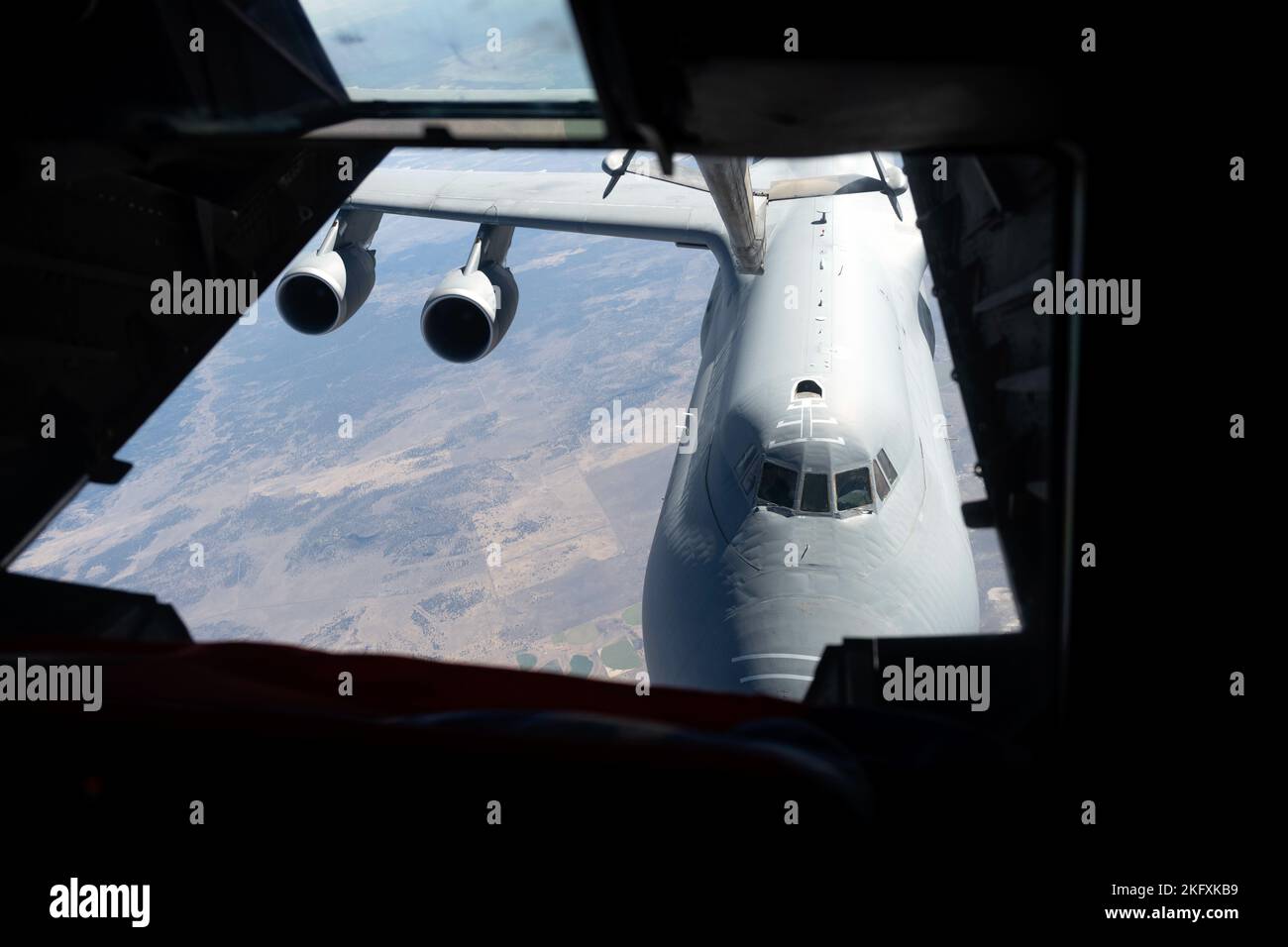 A C-5M Super Galaxy approaches a KC-10 Extender over Oregon, Oct. 13 ...