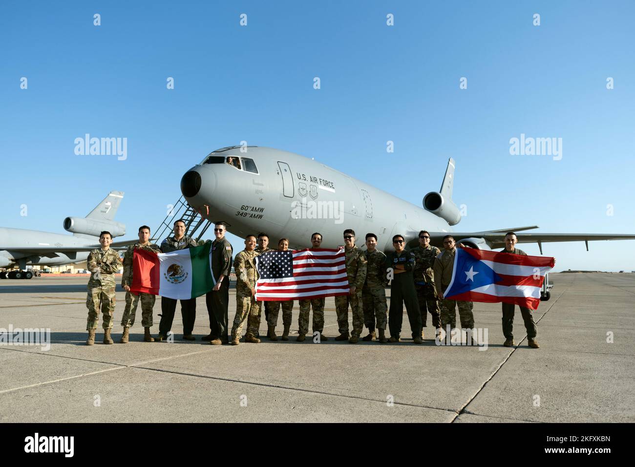 U.S. Airmen assigned to the 6th and 9th Air Refueling Squadrons stand ...