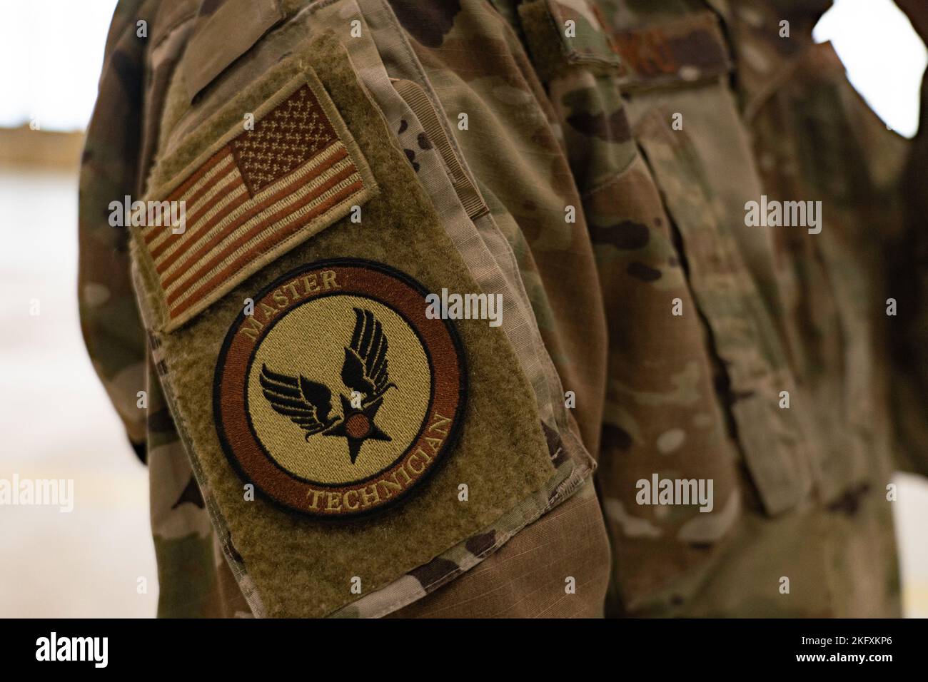 A master technician patch rests on the sleeve of Tech Sgt. Kegan Stanko ...