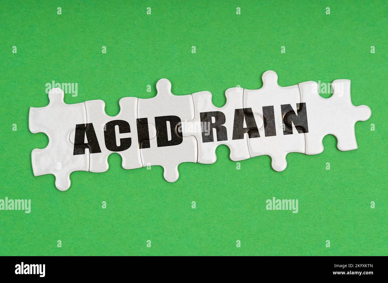 Environmental concept. On a green background, there are puzzles on ...