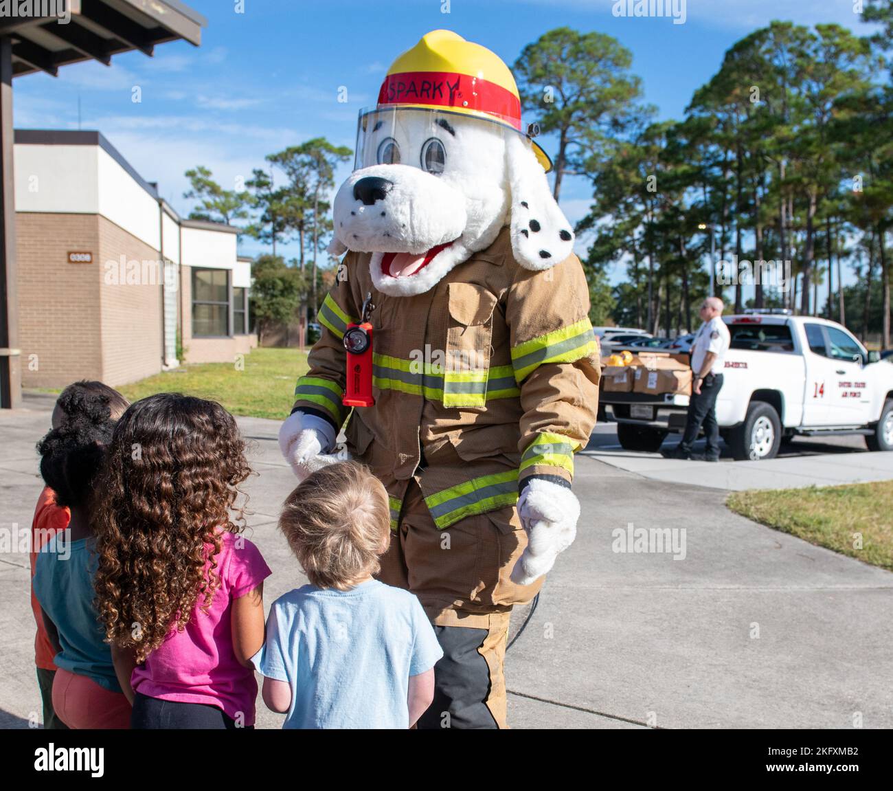 Sparky the fire dog, the official mascot of the National Fire Protection Association greets ...