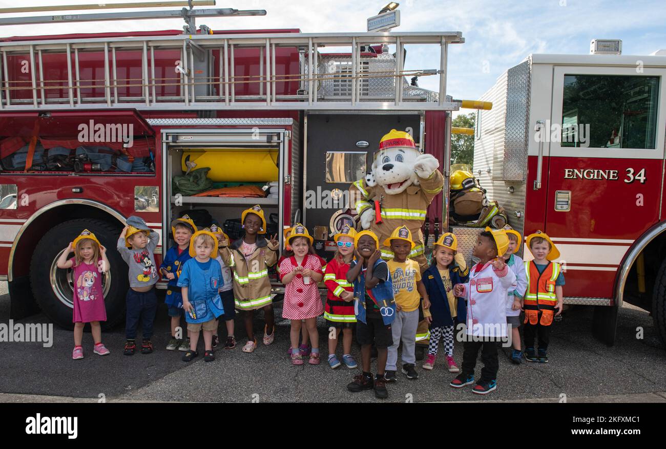 Children from the Child Development Center pose for a group photo with ...