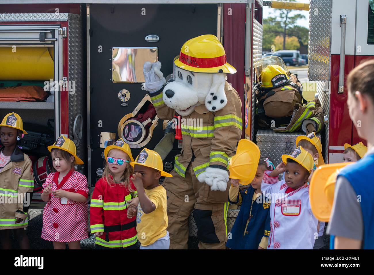 Children from the Child Development Center pose for a group photo with ...