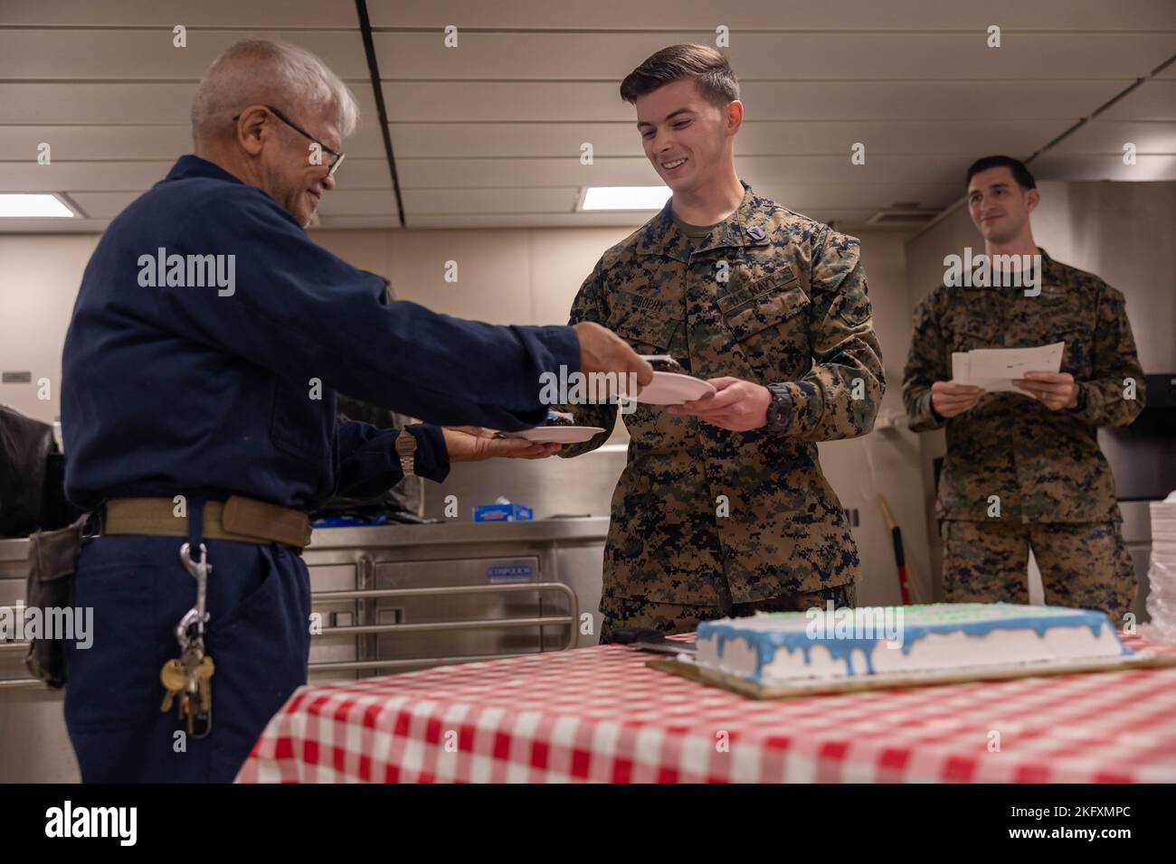 U.S. Navy Petty Officer 2nd Class Tanner Brophy, middle, a corpsman ...