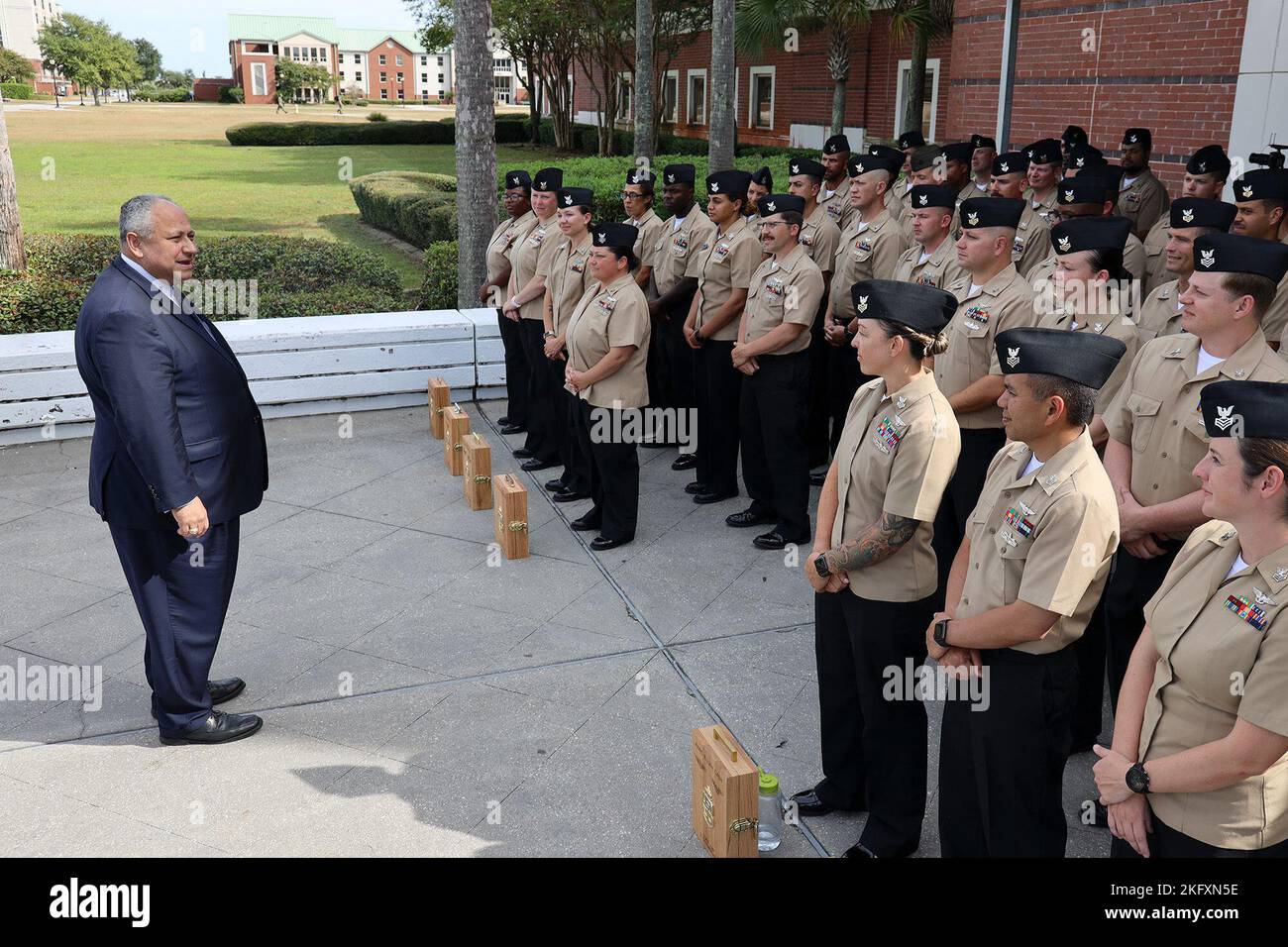 Secretary of the Navy Carlos Del Toro speaks with Sailors during a tour ...
