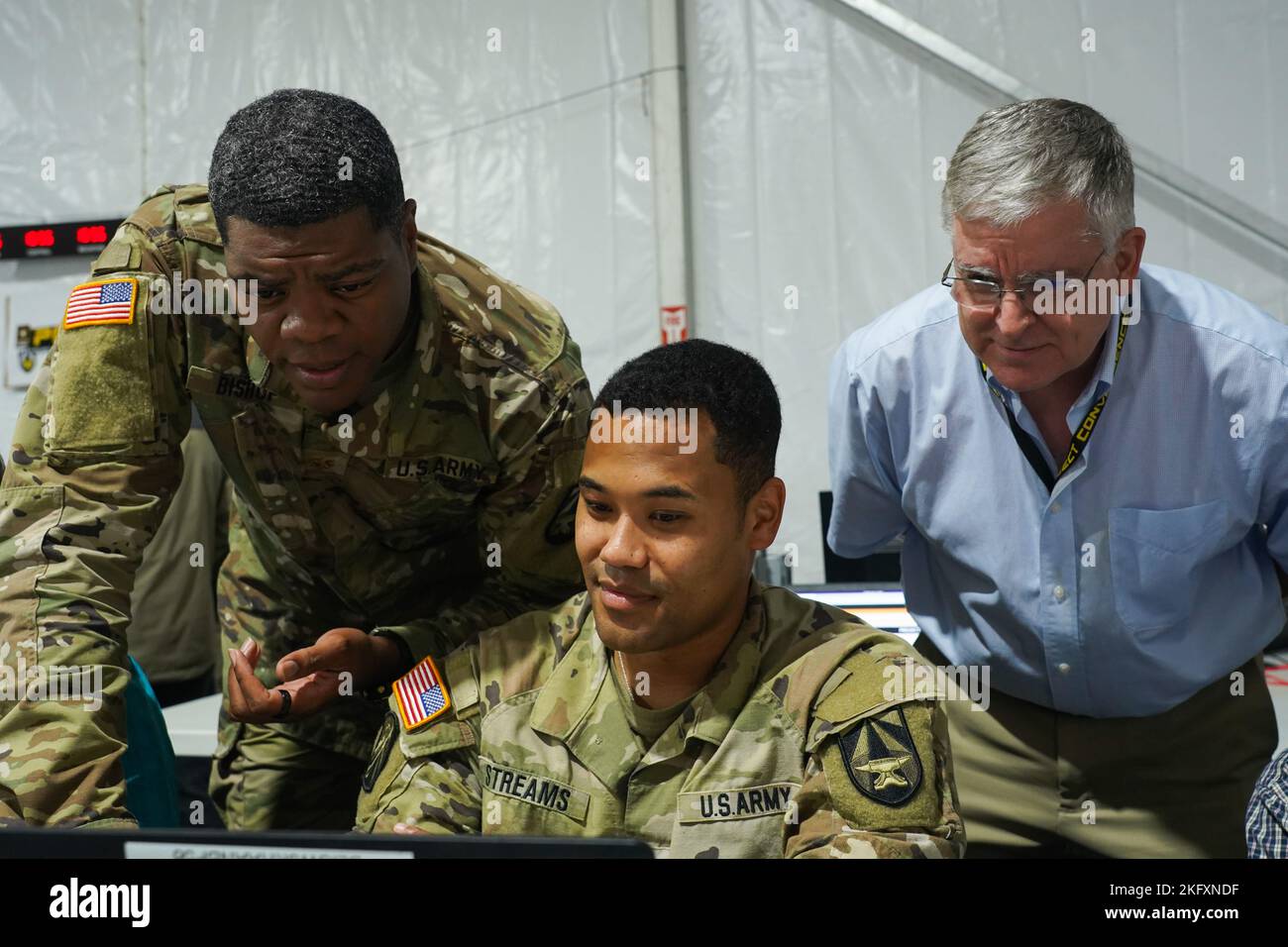 U.S. Army Soldiers Maj. Derrick Bishop, left, assigned to Joint ...