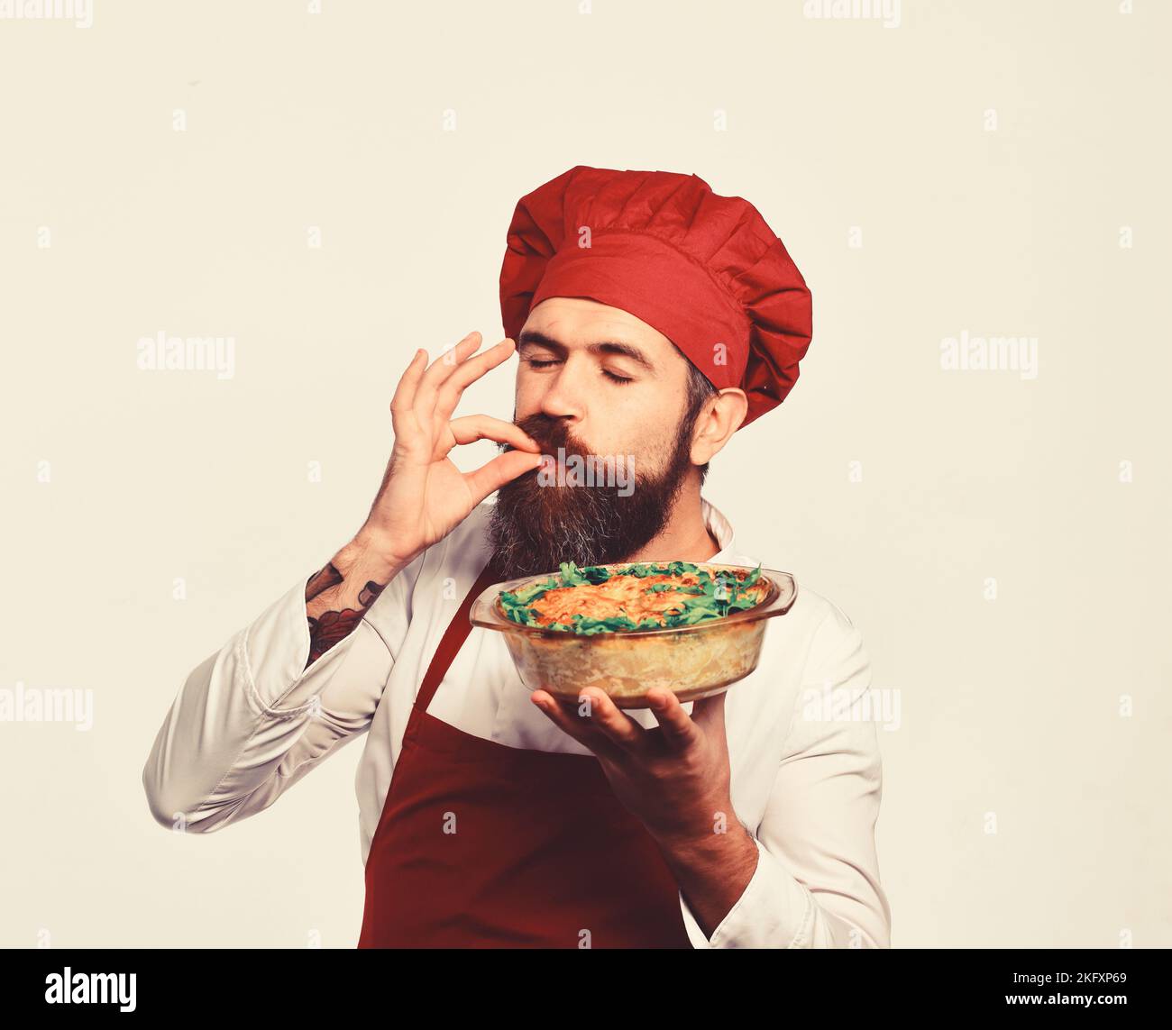 Portrait of chef cook showing baked potato dish Stock Photo - Alamy