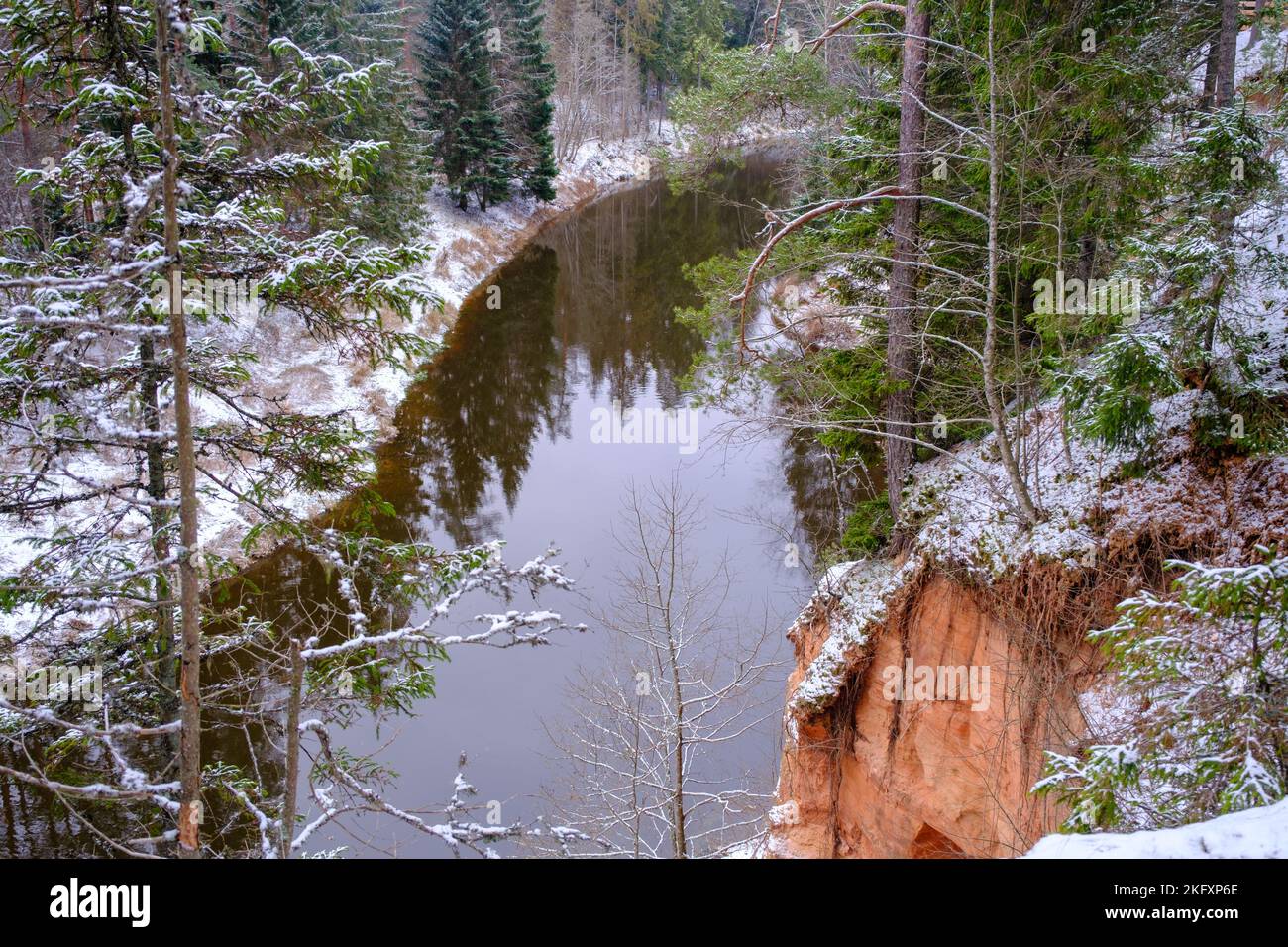The river Salaca is meandered by high sandstone cliffs. Skanaiskalns ...