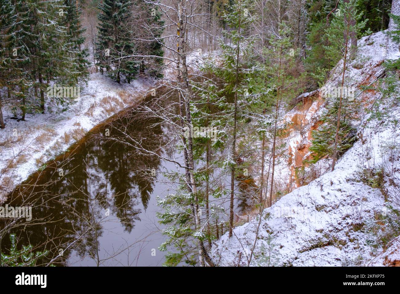 The river Salaca is meandered by high sandstone cliffs. Skanaiskalns ...