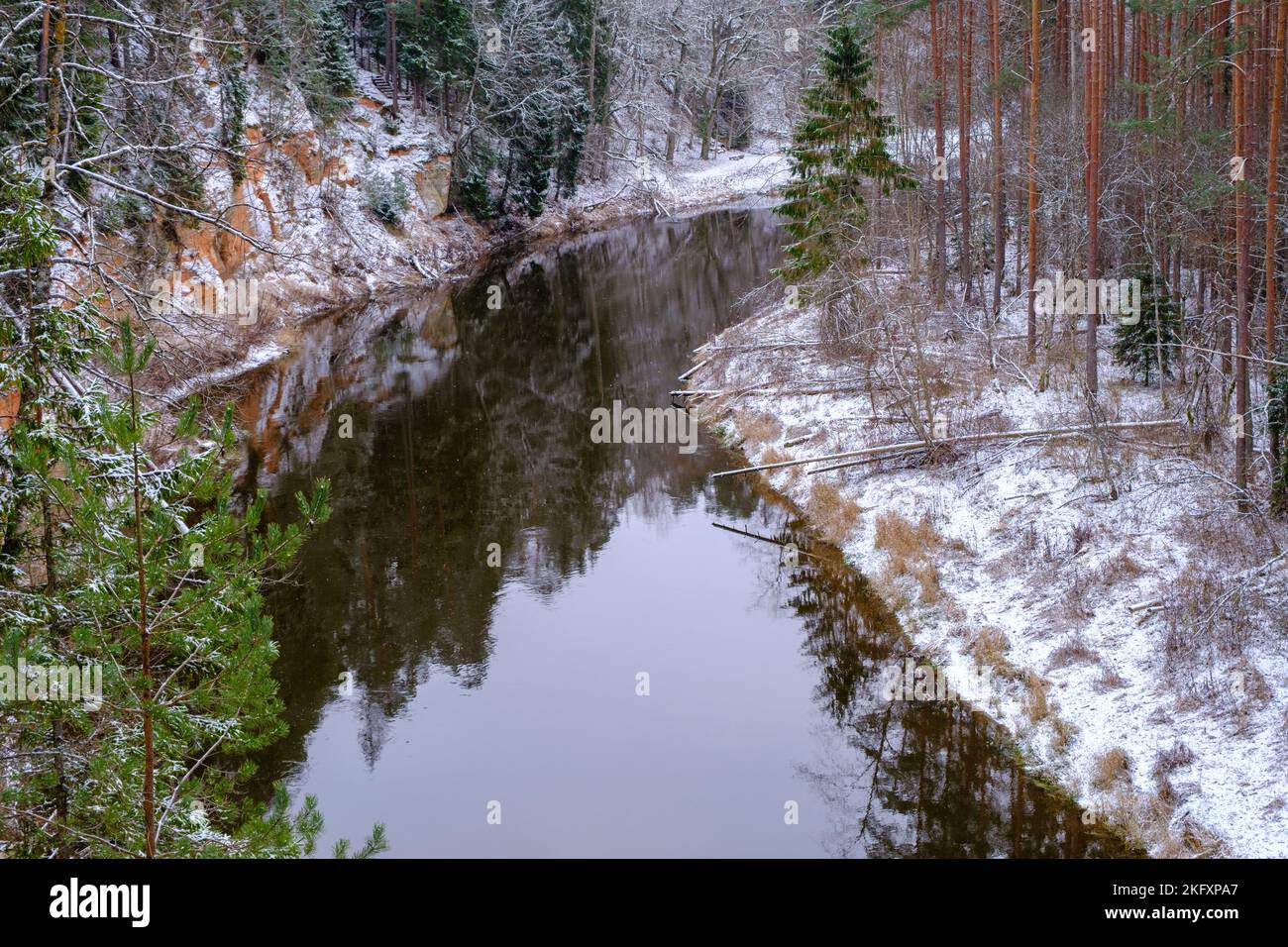 The river Salaca is meandered by high sandstone cliffs. Skanaiskalns ...