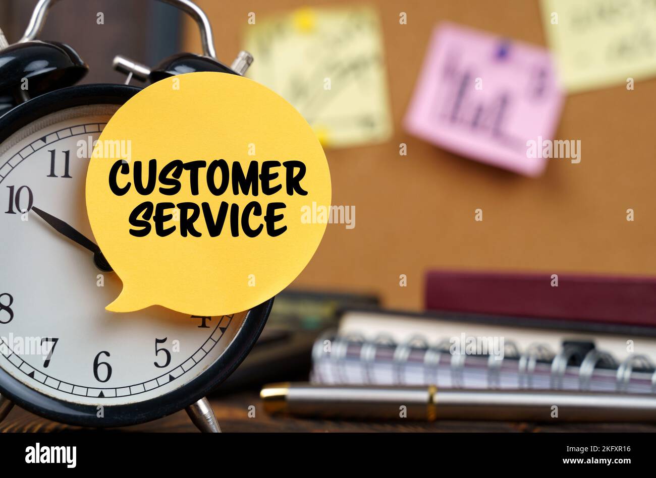 Business concept. The alarm clocks have a sticker with the inscription ...