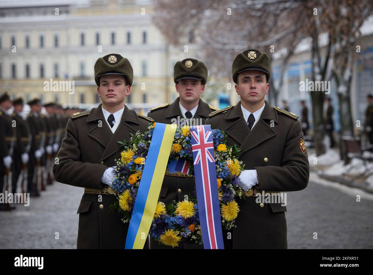 Kyiv, Ukraine. 19th Nov, 2022. Ukrainian honor guards carry a wreath ...