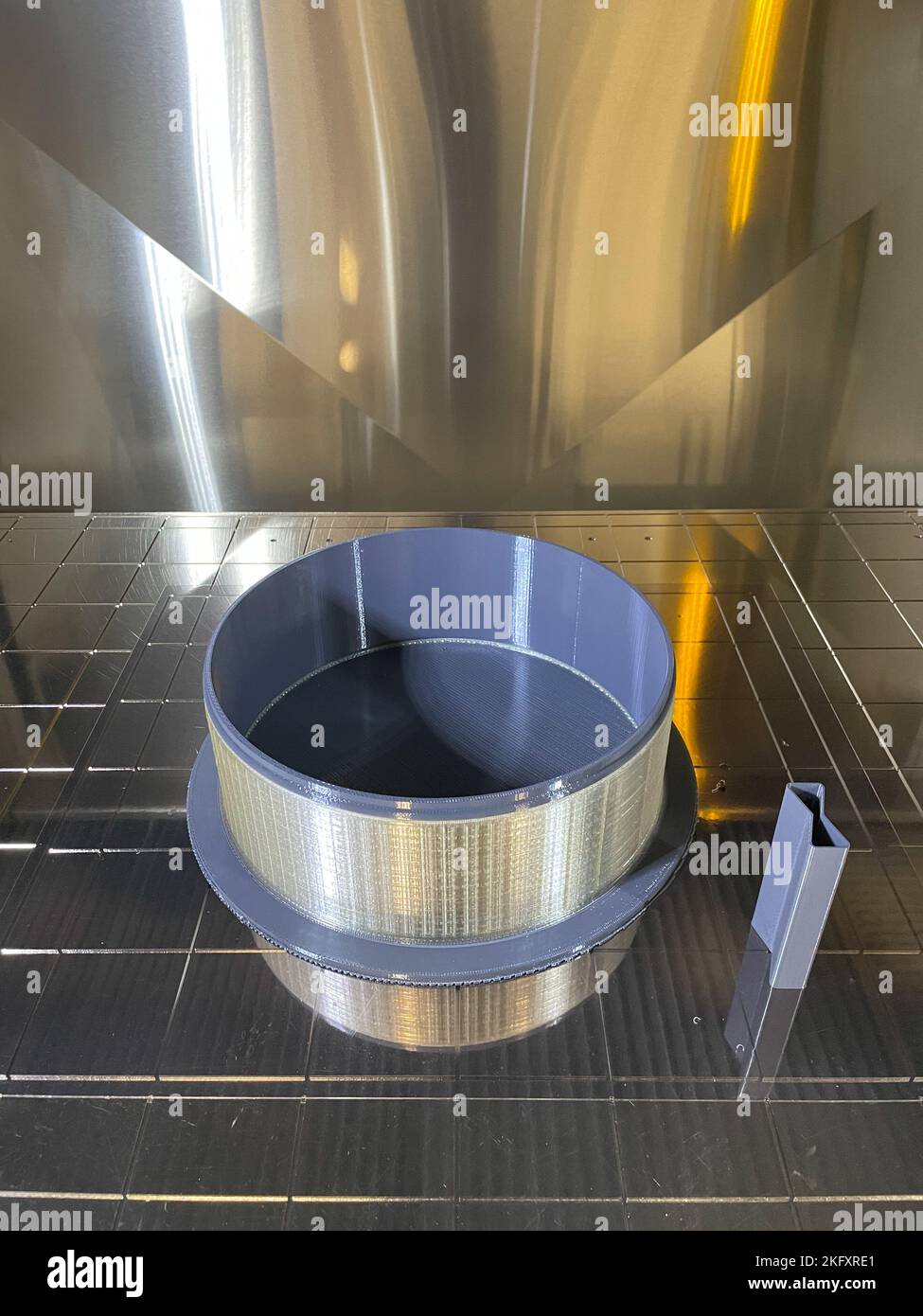 A Stratasys F900 3D printer manufactures a C-5 mixing chamber repair ...