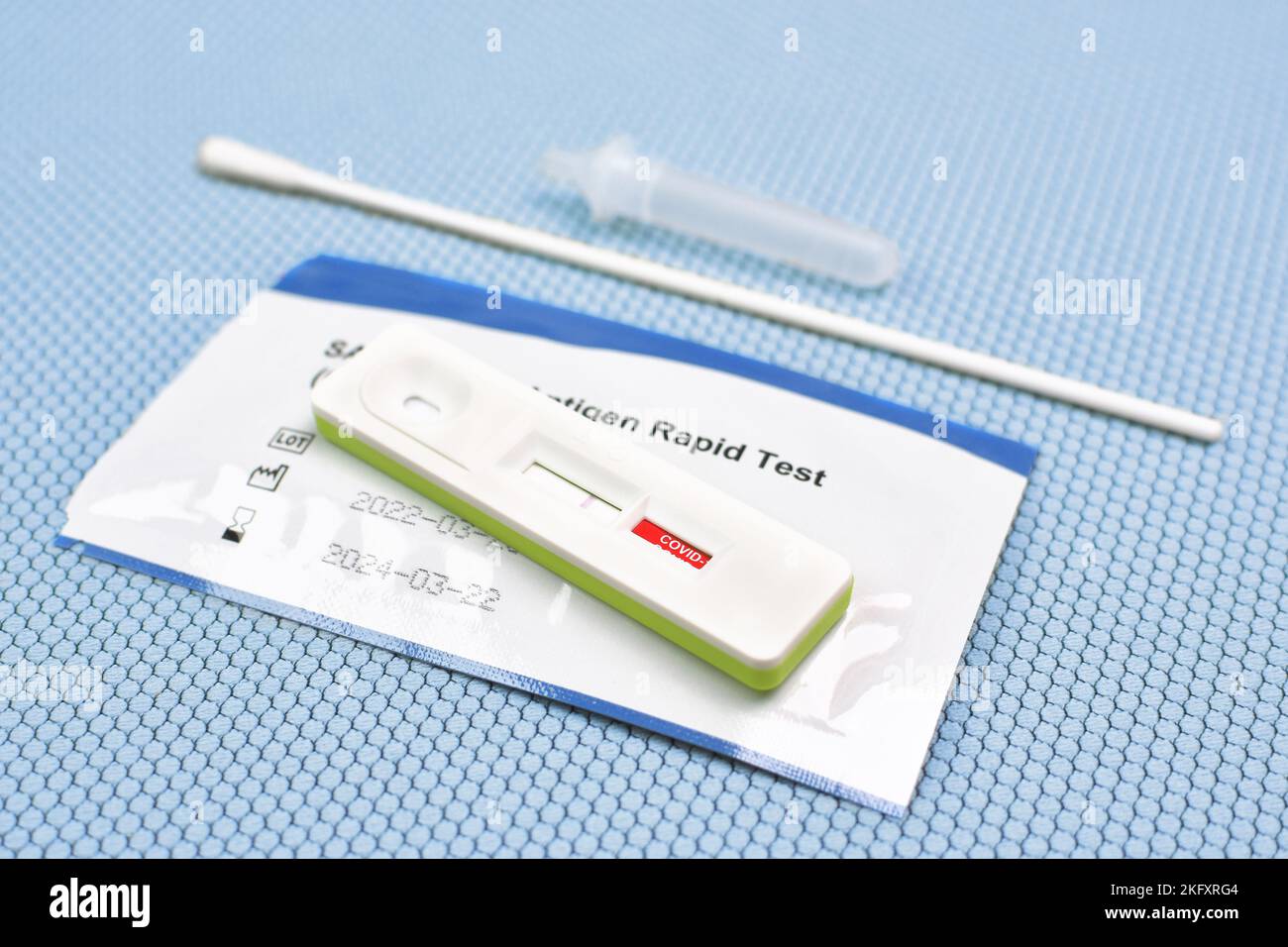 Covid-19 negative test result of Antigen test kit (ATK) on light blue ...