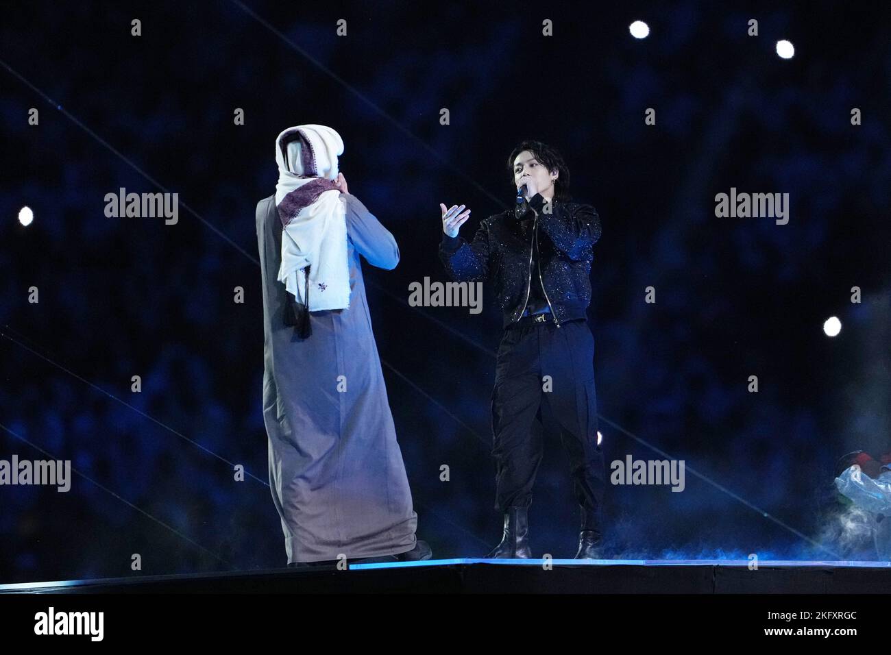 Al Khor, Qatar. 20th Nov, 2022. Singers Jung Kook (R) and Fahad Al ...
