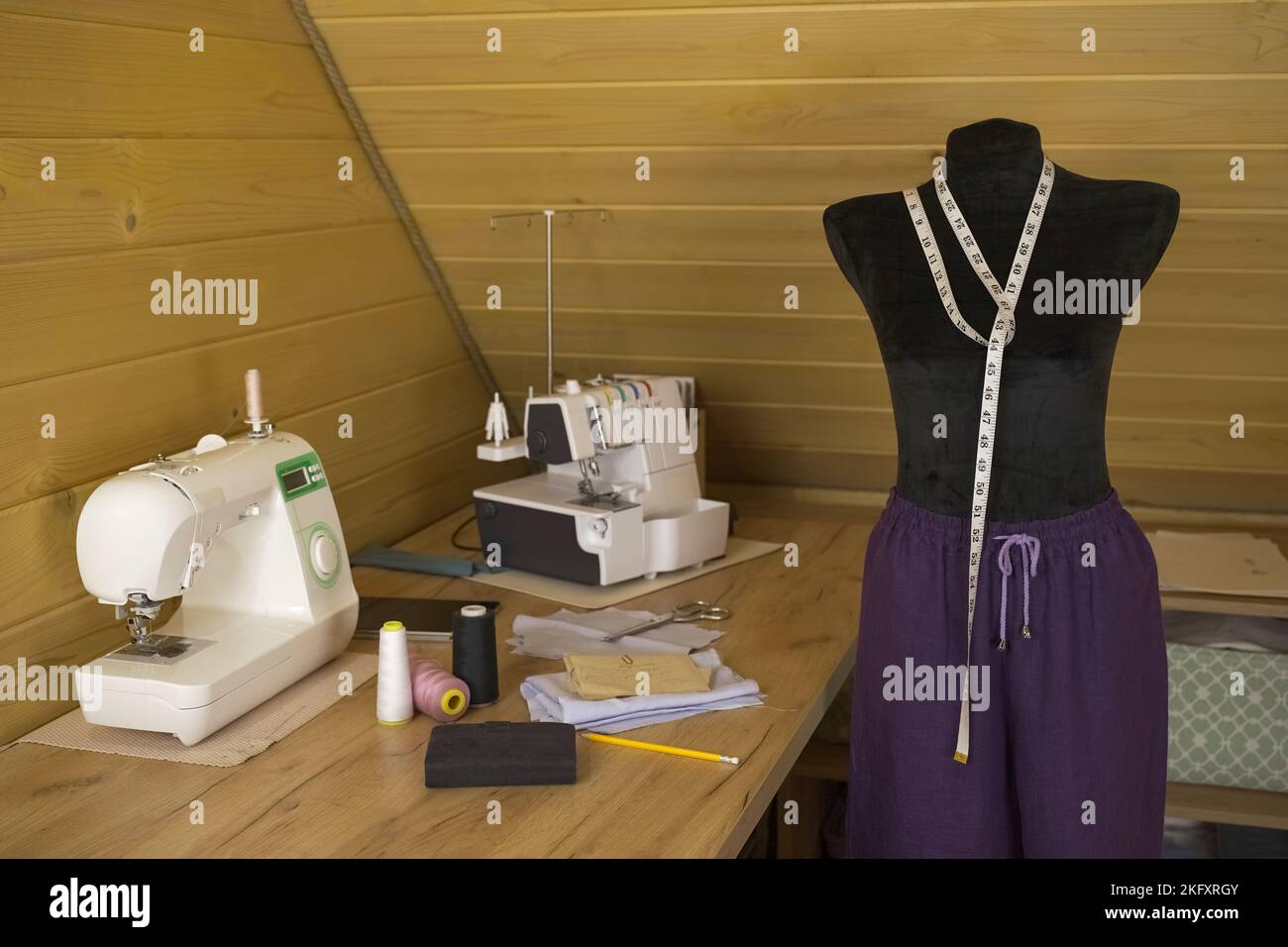 Background image of fashion designer sewing workshop. Background Stock ...